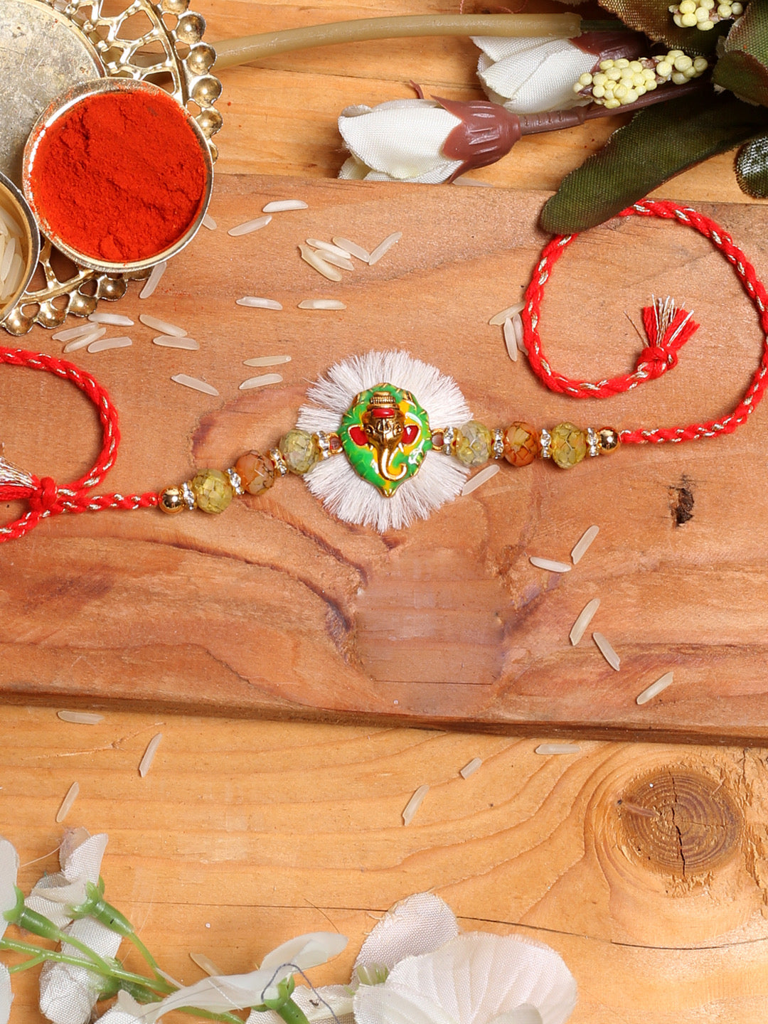 Lord Ganesha on Leaf Embellished Rakhi – Aapno Rajasthan
